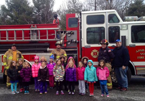 Firefighters teach Daisy Scouts about fire safety